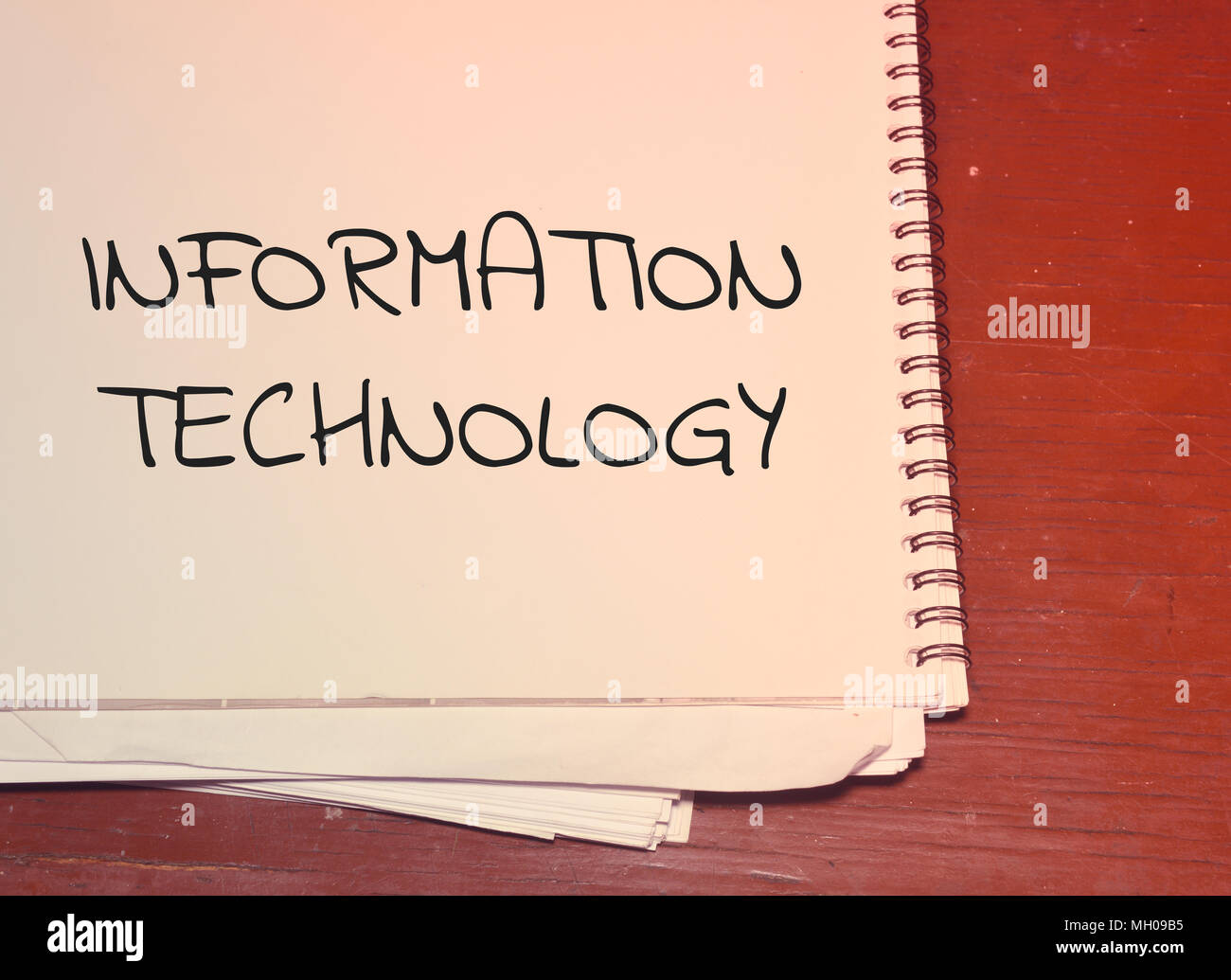 Information technology word written on white paper Stock Photo - Alamy