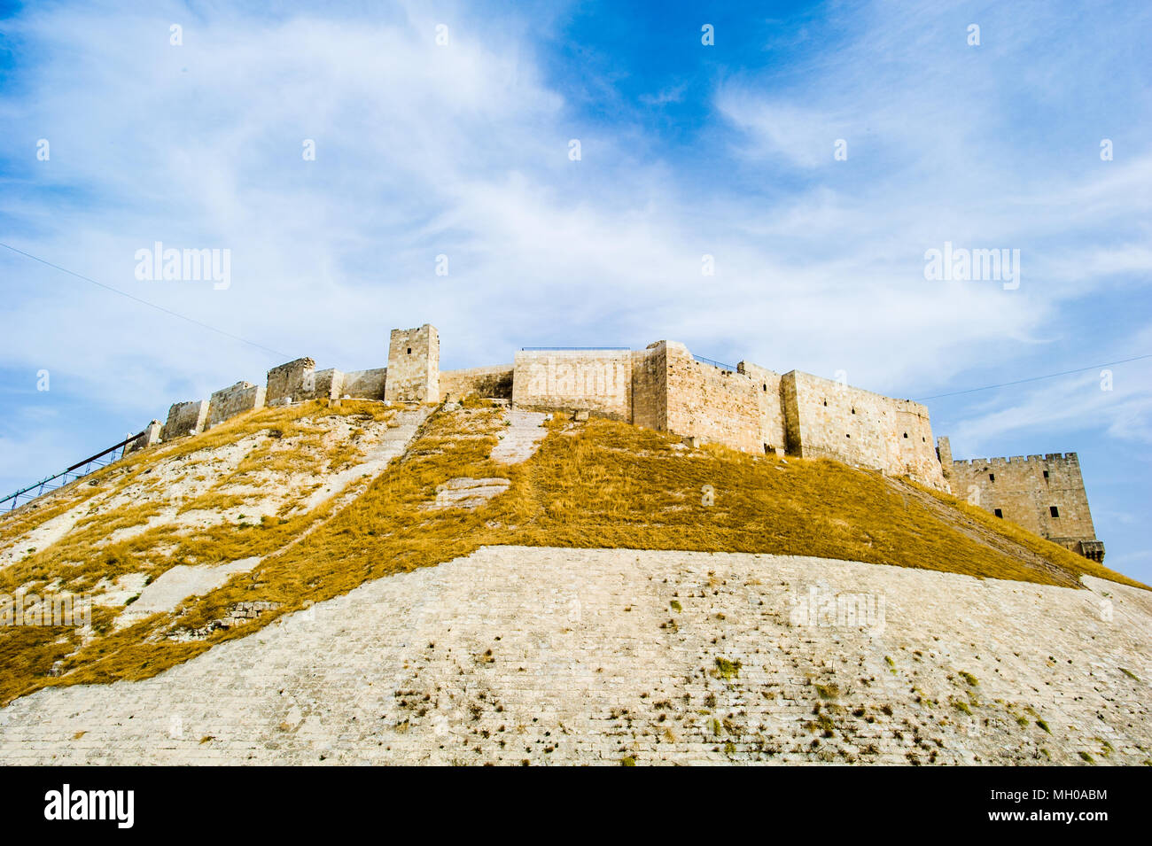Citadel of Aleppo, a large medieval fortified palace of the old city of ...