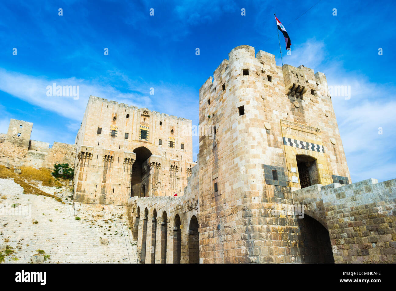 Citadel of Aleppo, a large medieval fortified palace, the old city of ...