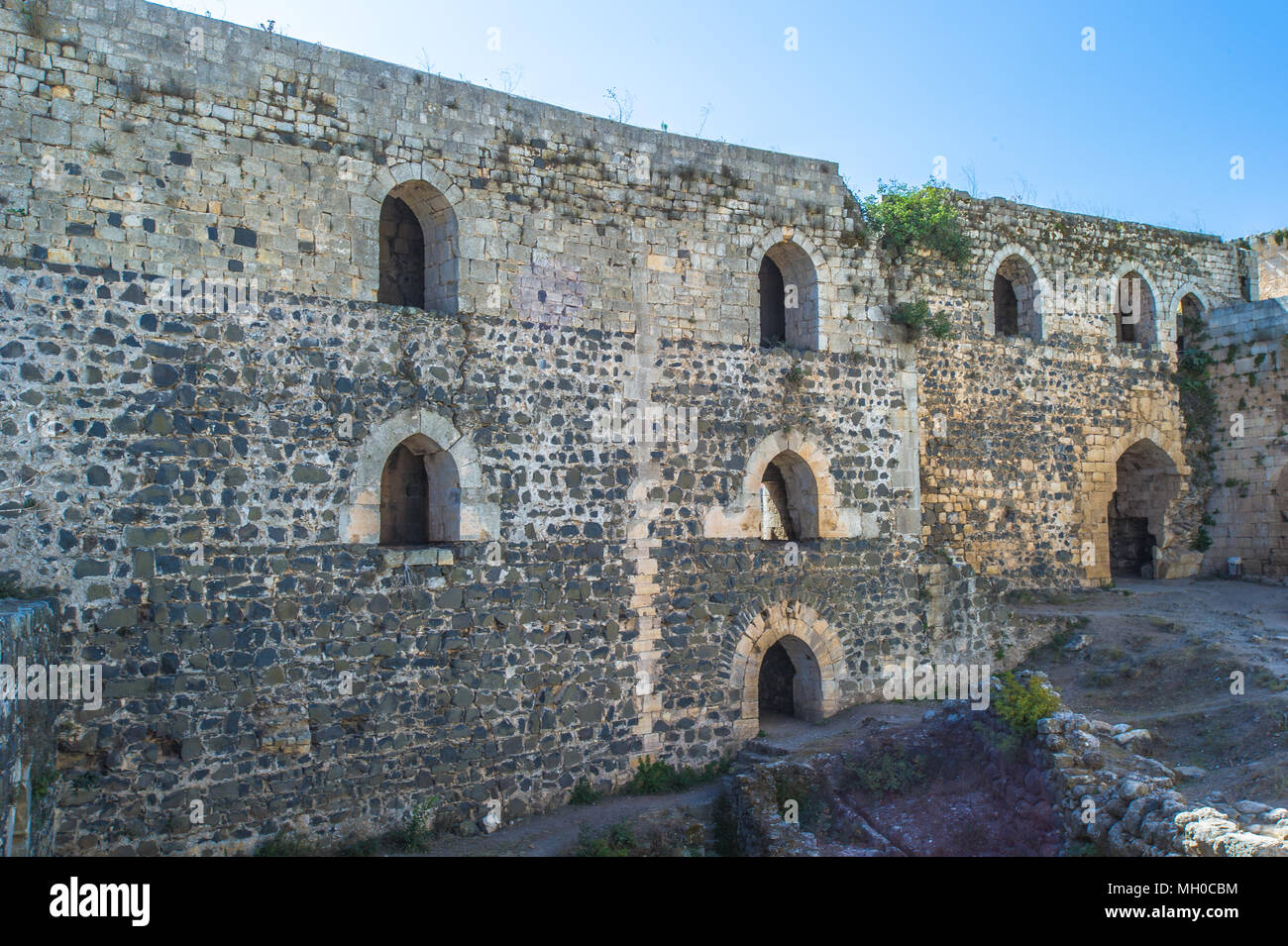 Part of the Krak des Chevaliers, a Crusader castle in Syria and one of ...