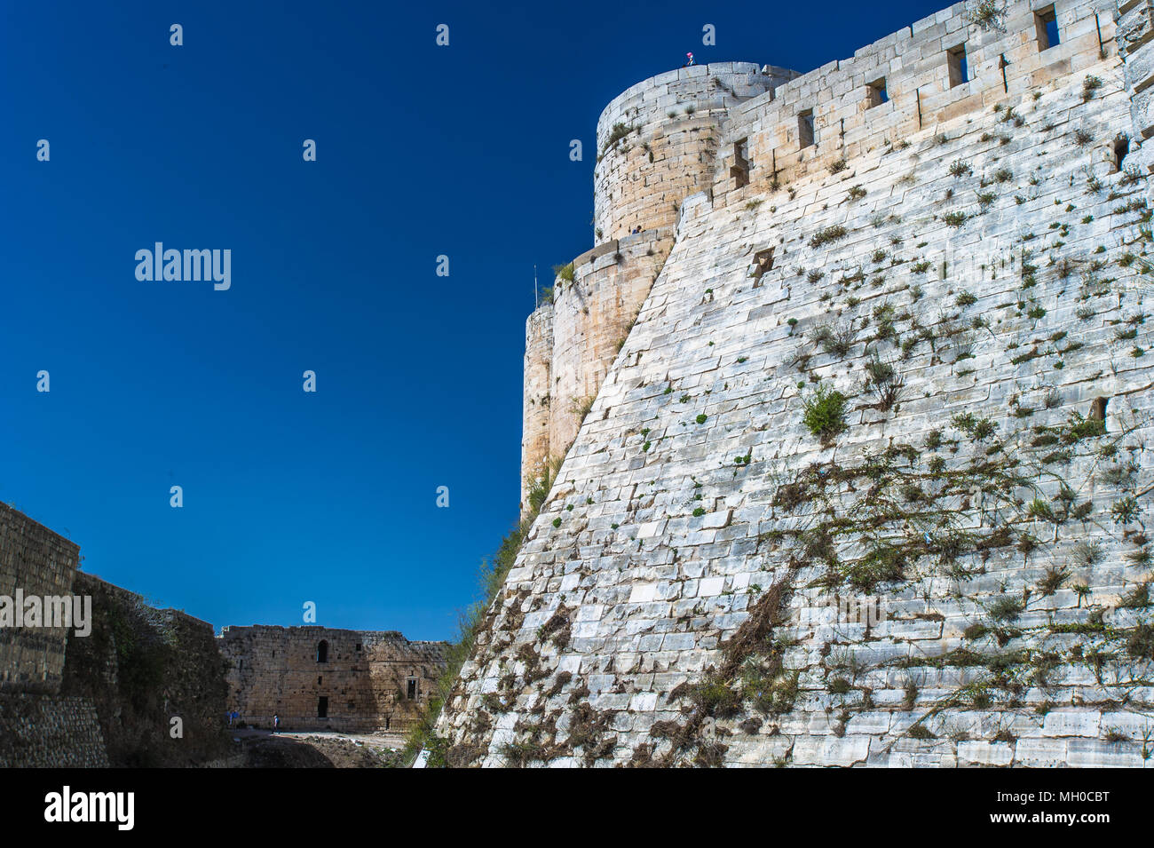 Part of the Krak des Chevaliers, a Crusader castle in Syria and one of ...