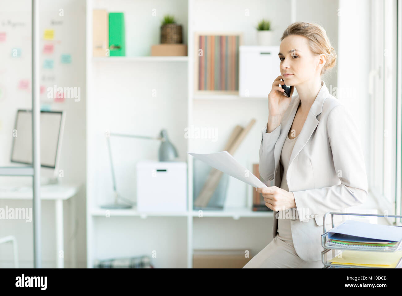 Calling in office Stock Photo - Alamy
