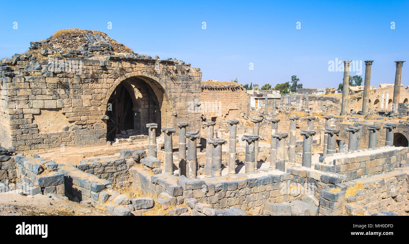 Roman ruins north of the citadel. City of Bosra, Syria. UNESCO world ...