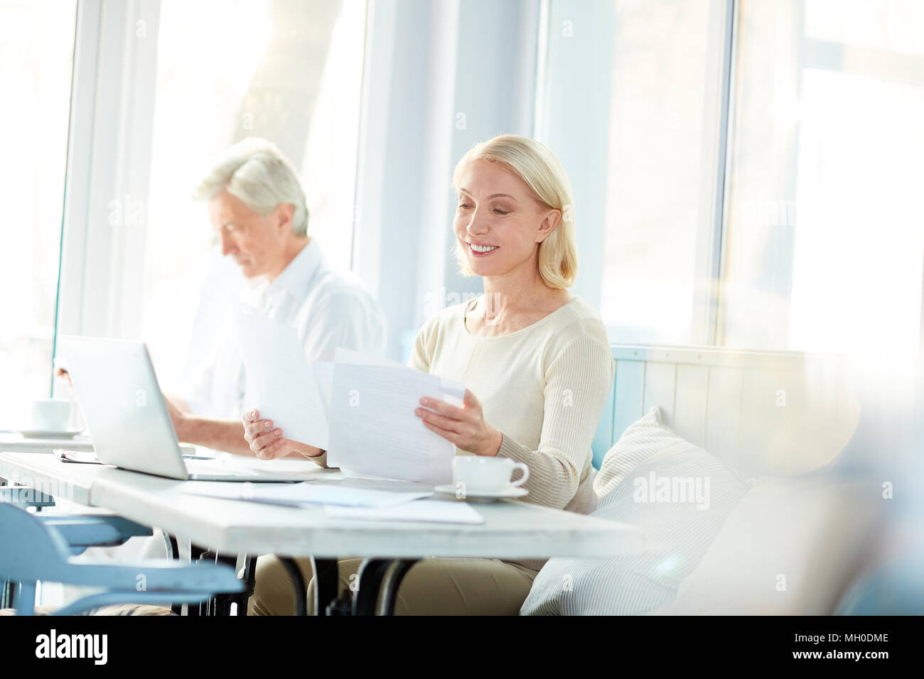 Blonde busy caucasian adult woman hi-res stock photography and images ...