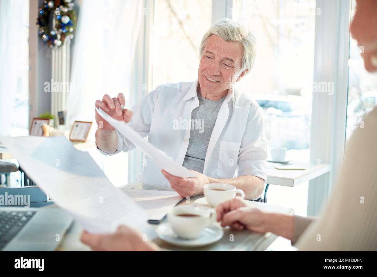Pointing at document Stock Photo - Alamy
