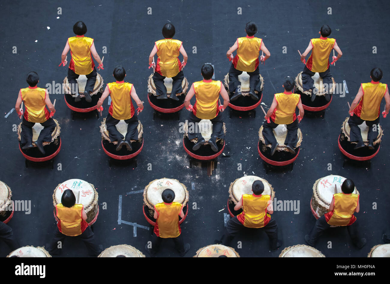 Teenagers performing chinese lion dance drum rhythmic show and dance at ...