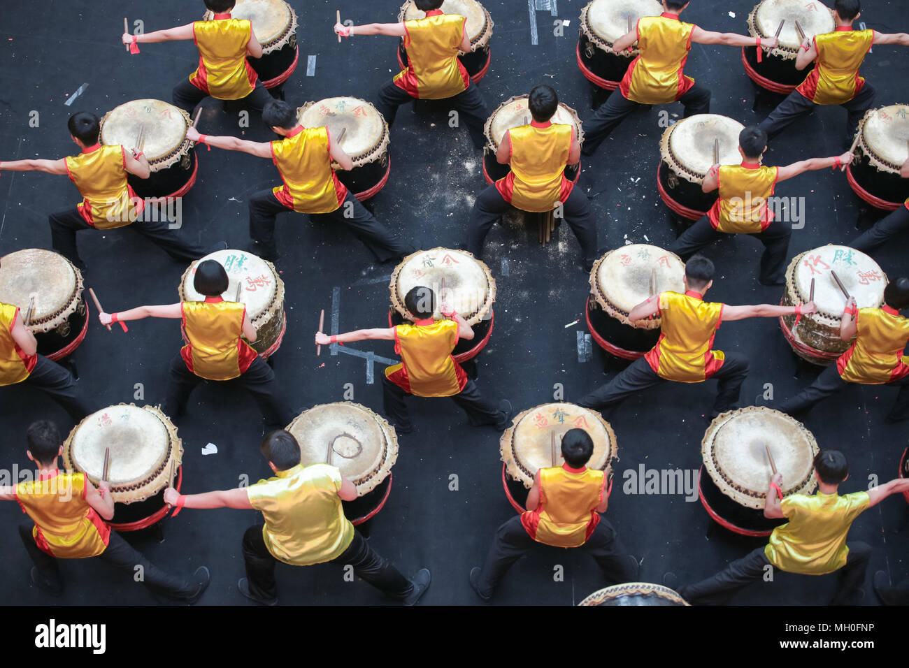 Teenagers performing chinese lion dance drum rhythmic show and dance at ...