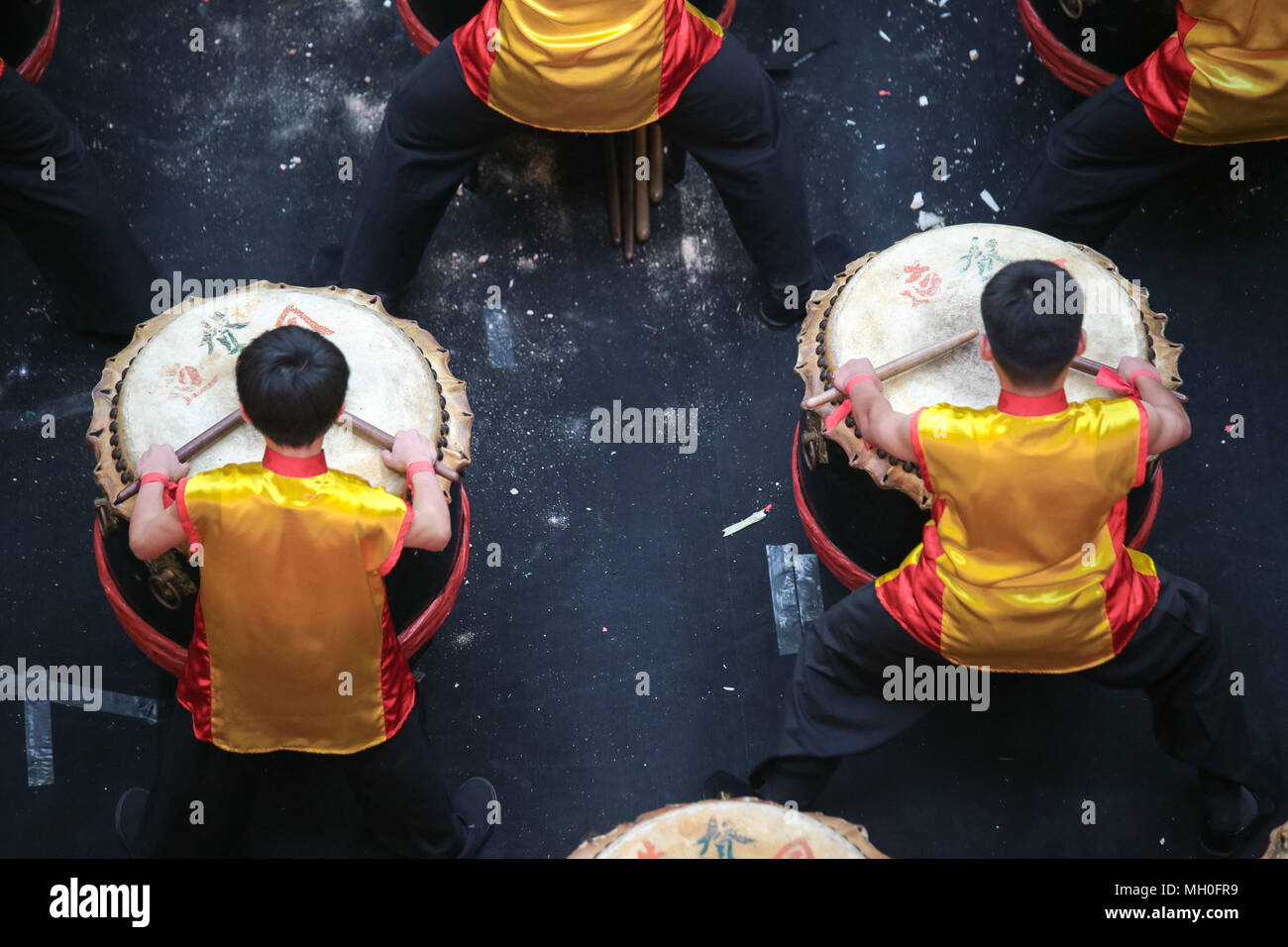 Teenagers performing chinese lion dance drum rhythmic show and dance at ...