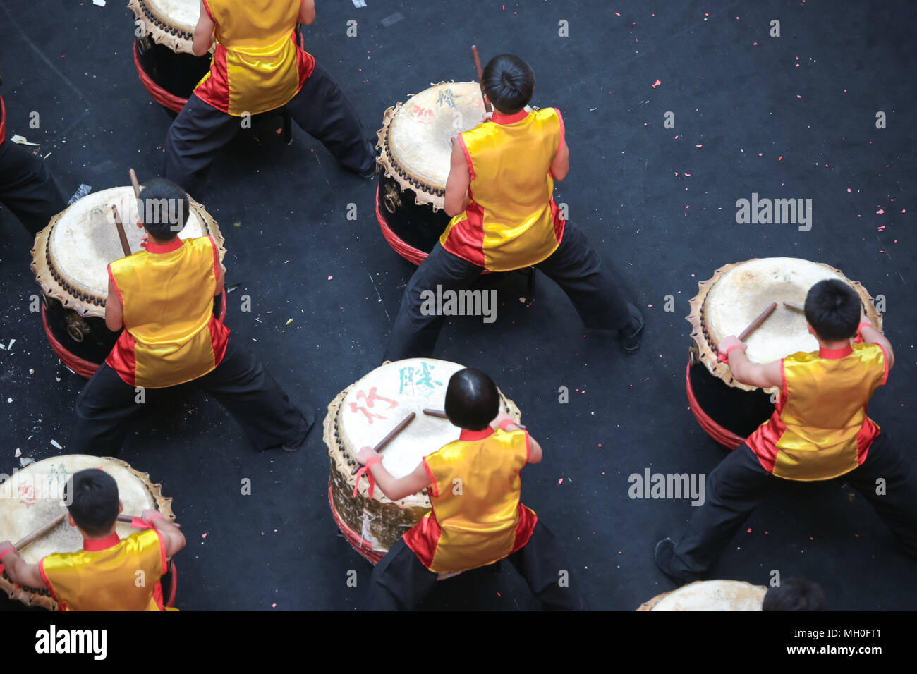 Teenagers performing chinese lion dance drum rhythmic show and dance at ...