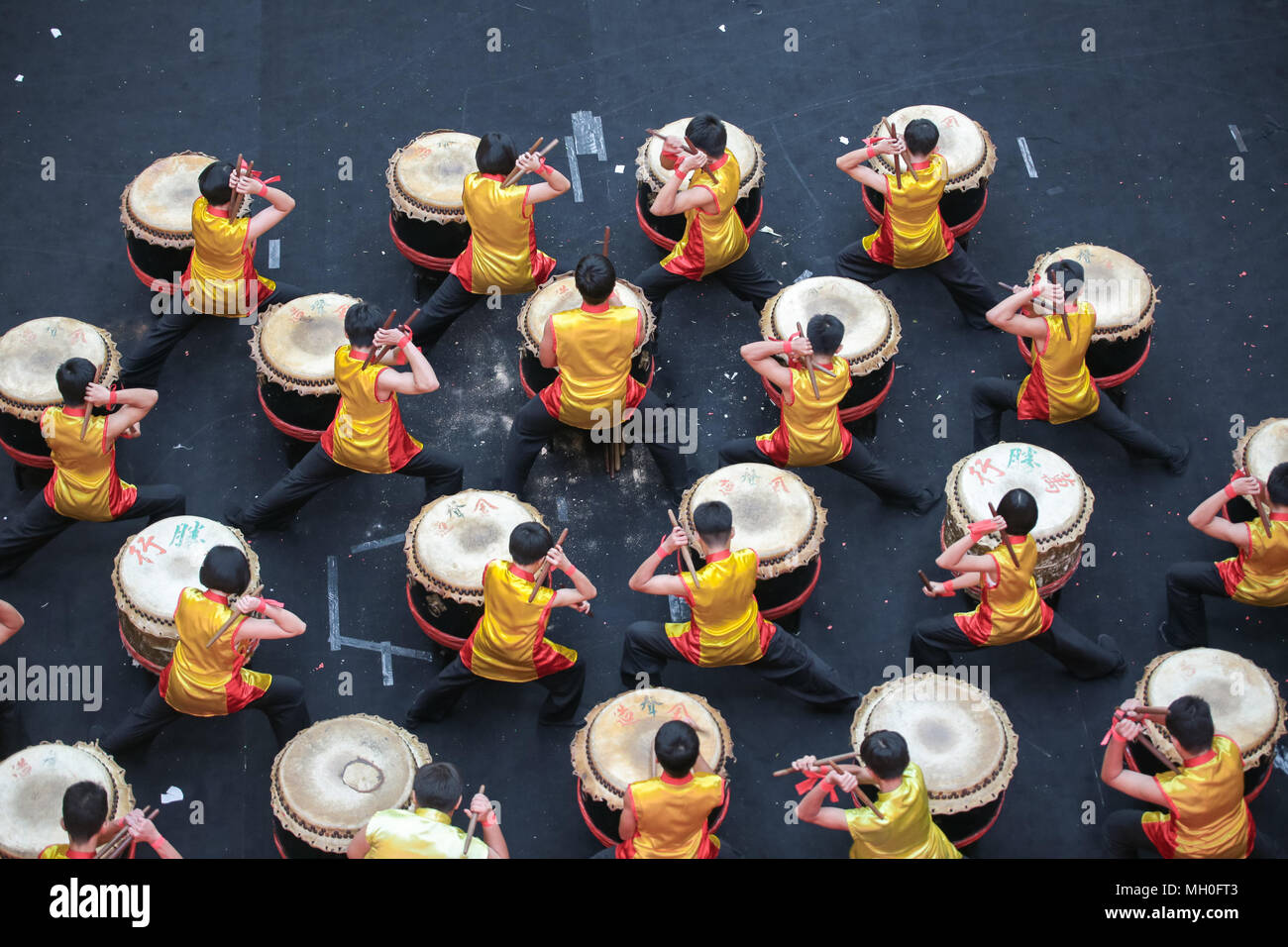 Teenagers performing chinese lion dance drum rhythmic show and dance at ...