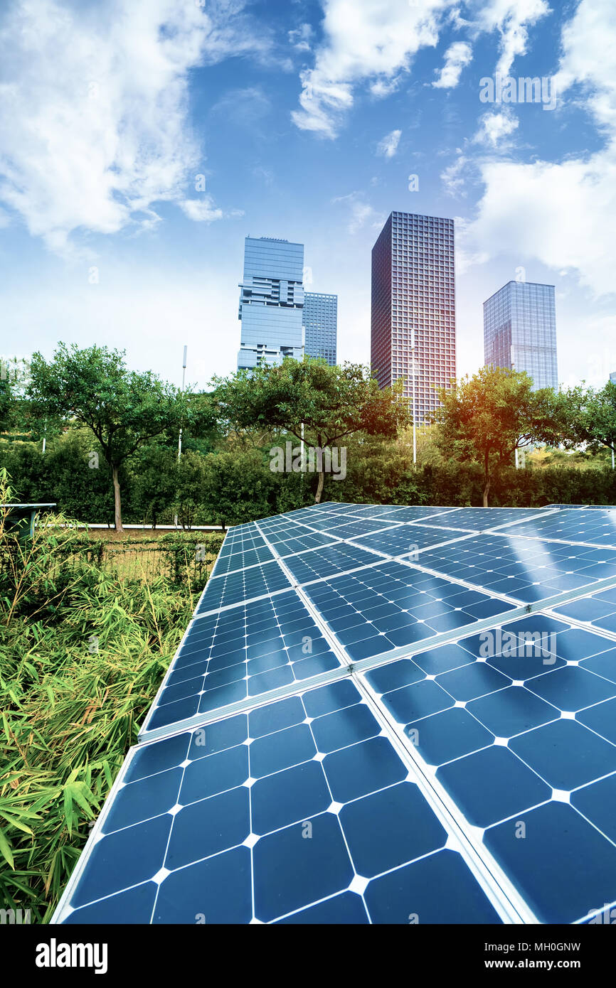 Solar Panels In The Park Of Modern City Stock Photo - Alamy