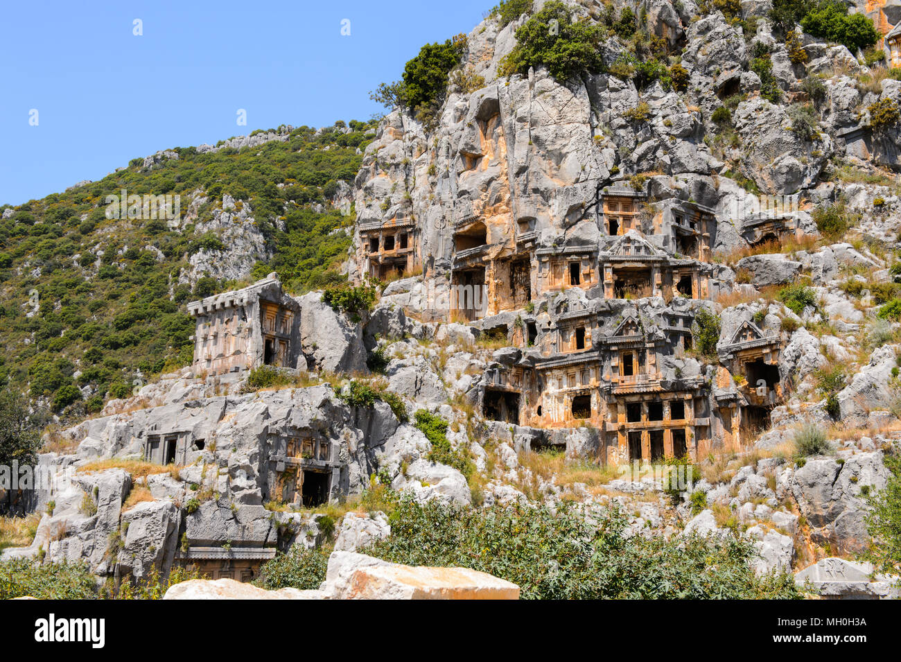 Ancient rock cut tombs of the Lycian necropolis, Myra, Turkey Stock ...