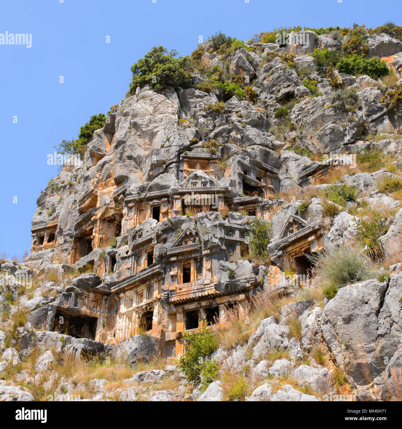 Ancient rock cut tombs of the Lycian necropolis, Myra, Turkey Stock ...