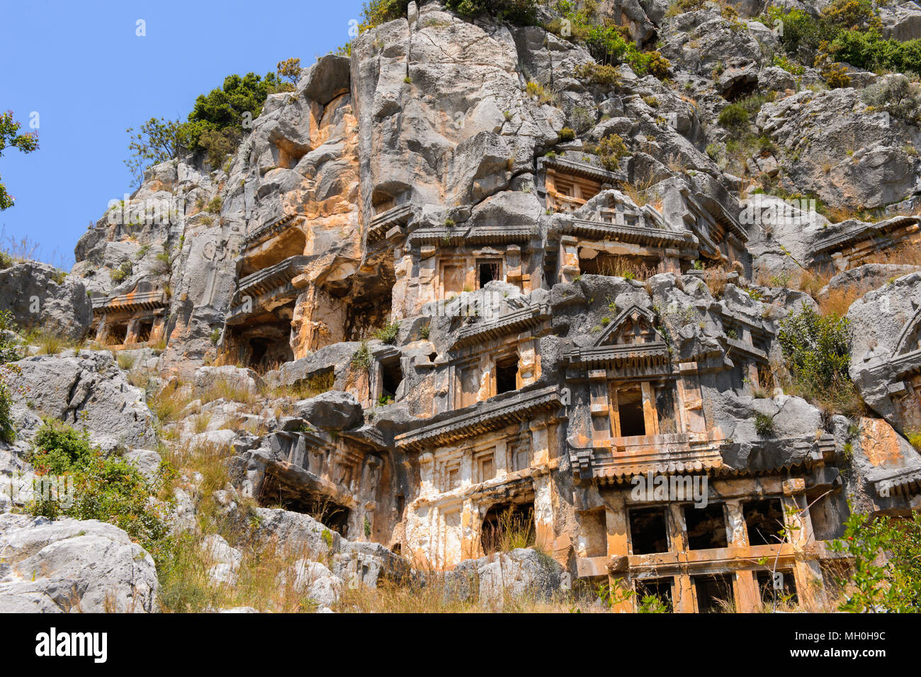 Ancient rock cut tombs of the Lycian necropolis, Myra, Turkey Stock ...