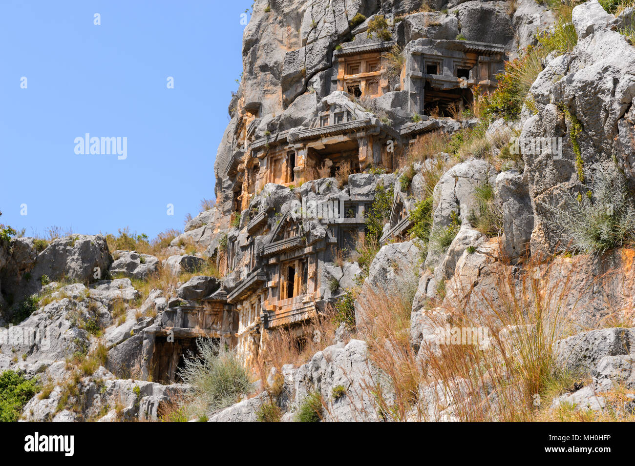 Rock cut tombs of the ancient Lycian necropolis, Myra, Turkey Stock ...