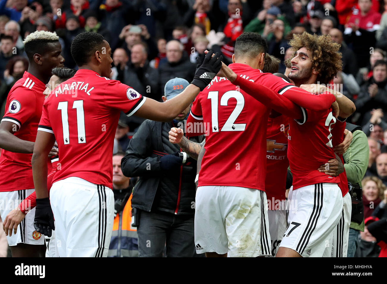 Manchester United's Marouane Fellaini (right) celebrates scoring his ...