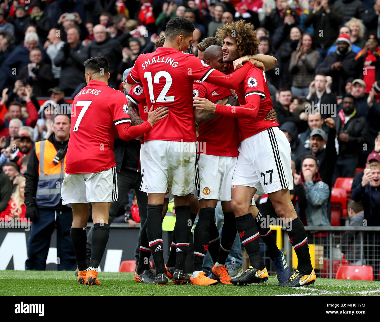 Manchester United's Marouane Fellaini (right) celebrates scoring his ...