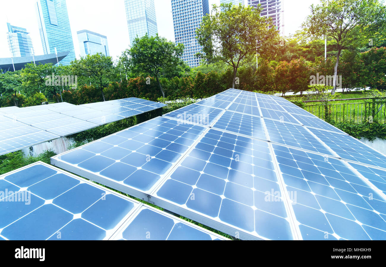 solar panel plant with urban landscape landmarks,Ecological energy ...