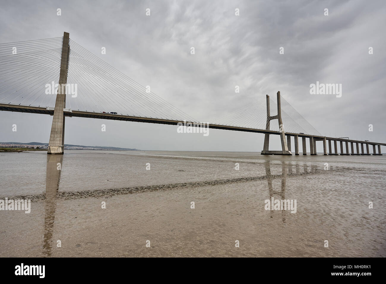 The Vasco da Gama Bridge in Lisbon, Portugal in a summer day. spring ...