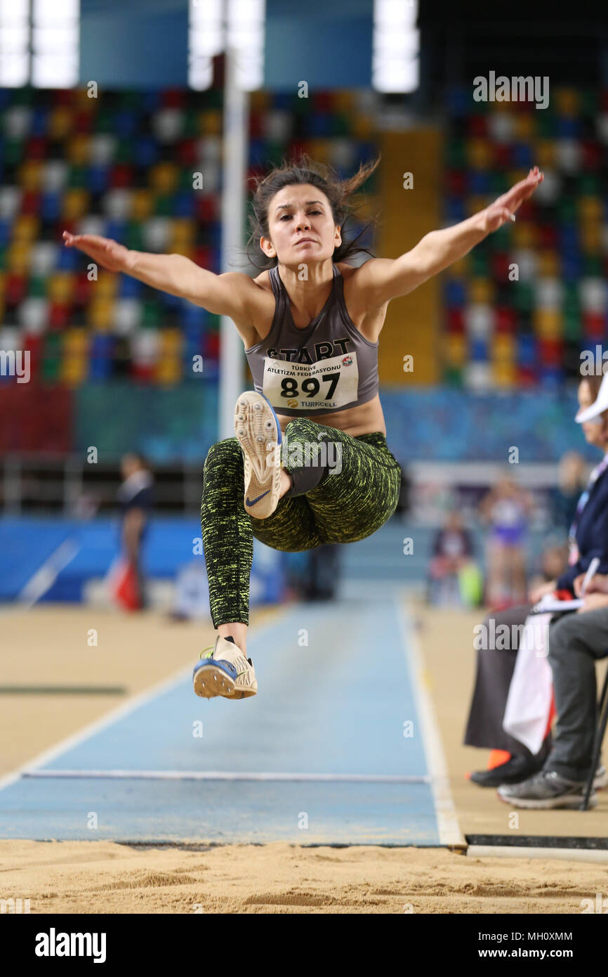 ISTANBUL, TURKEY - JANUARY 14, 2018: Undefined athlete long jumping ...