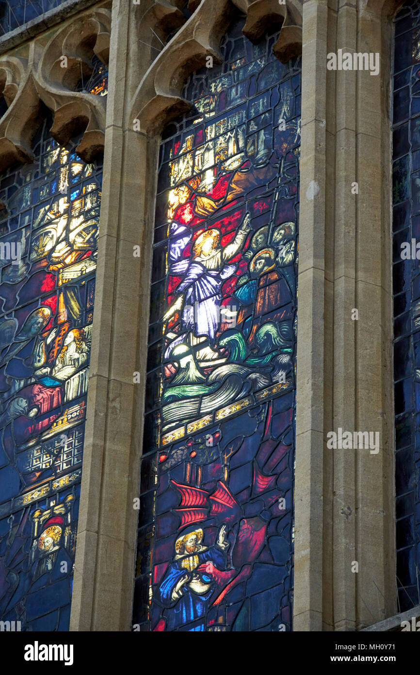 sun shining through the stained glass window in the east window of bath ...
