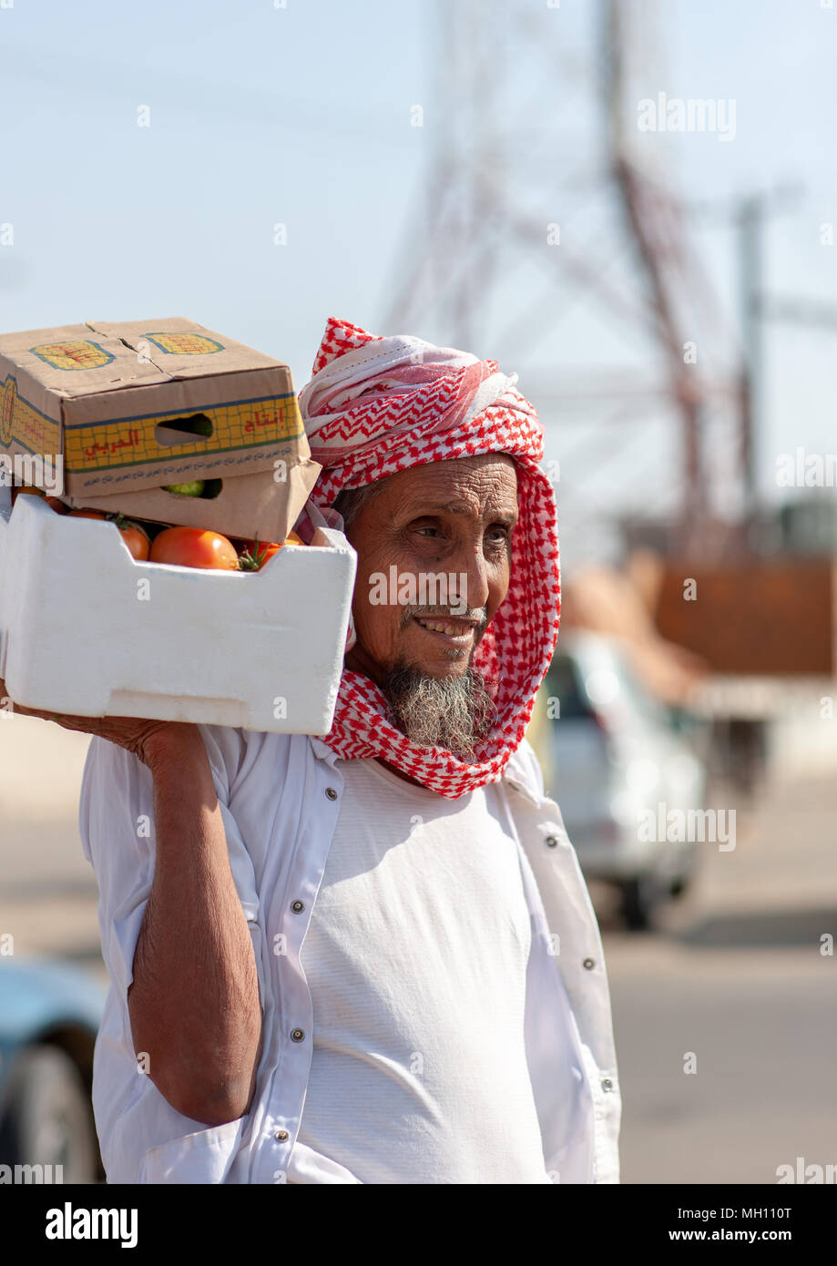 Portrait of a saudi man in a market wearing a kaffiyeh, Jizan Province ...