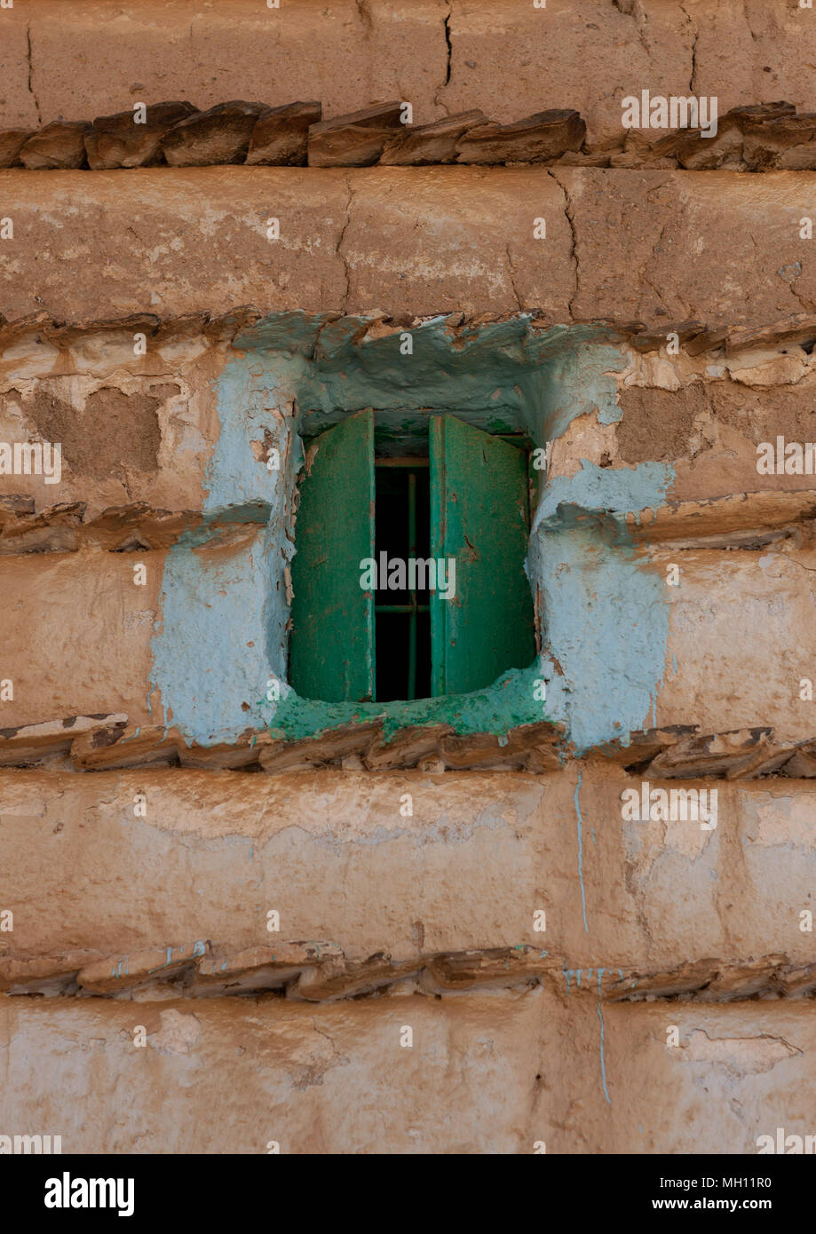 Window of a traditional clay and silt home in a village, Najran ...