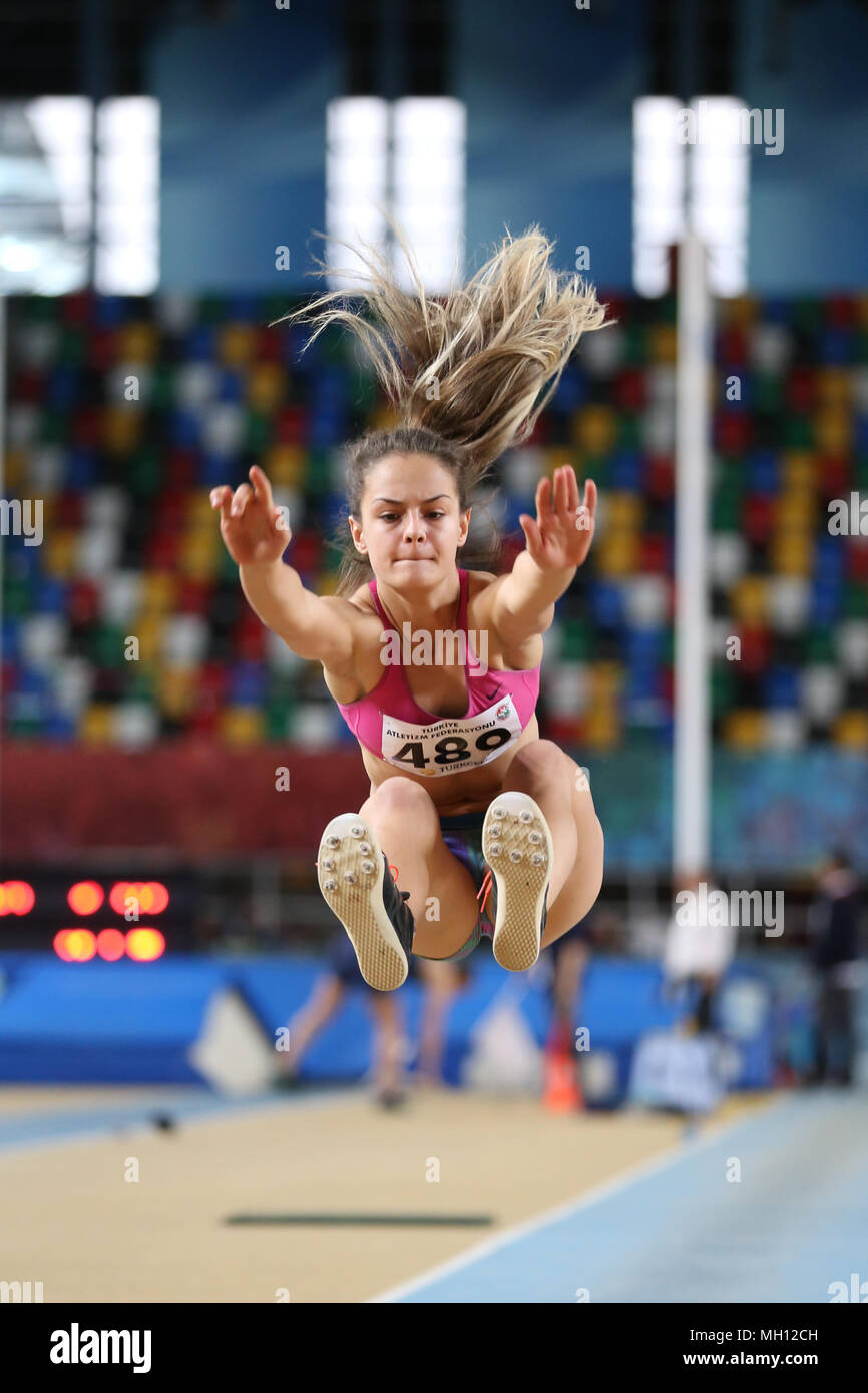 ISTANBUL, TURKEY - JANUARY 14, 2018: Undefined athlete long jumping ...