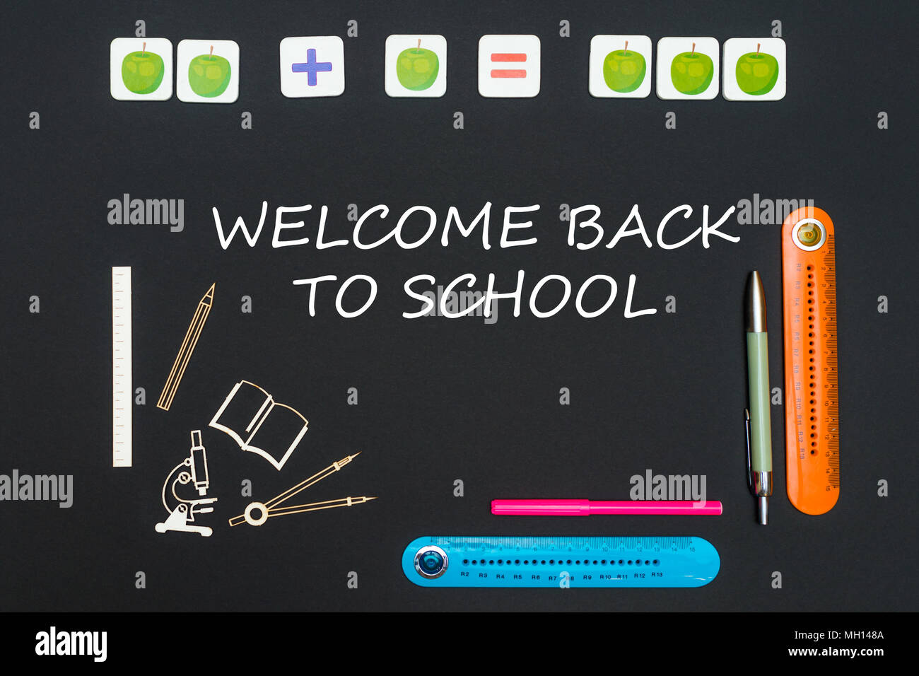 concept back to school, above stationery supplies and text welcome back ...