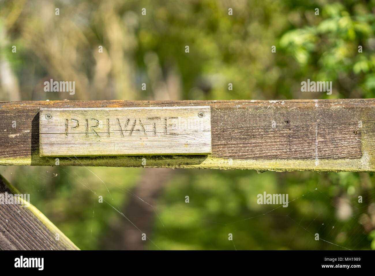 Wooded gate with Private sign Stock Photo - Alamy