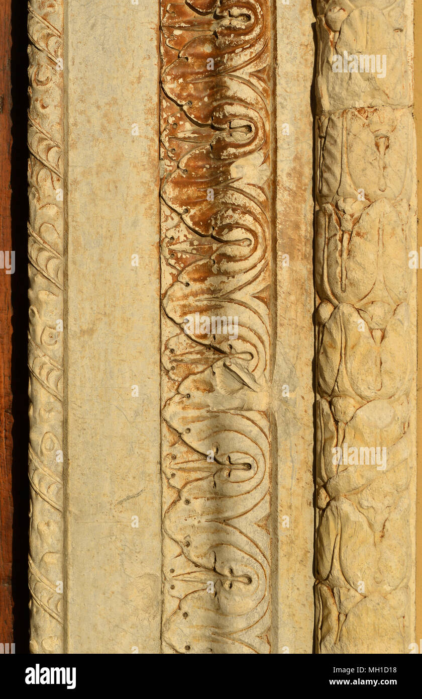 Ancient medieval portal with leaves motif reliefs as background Stock ...