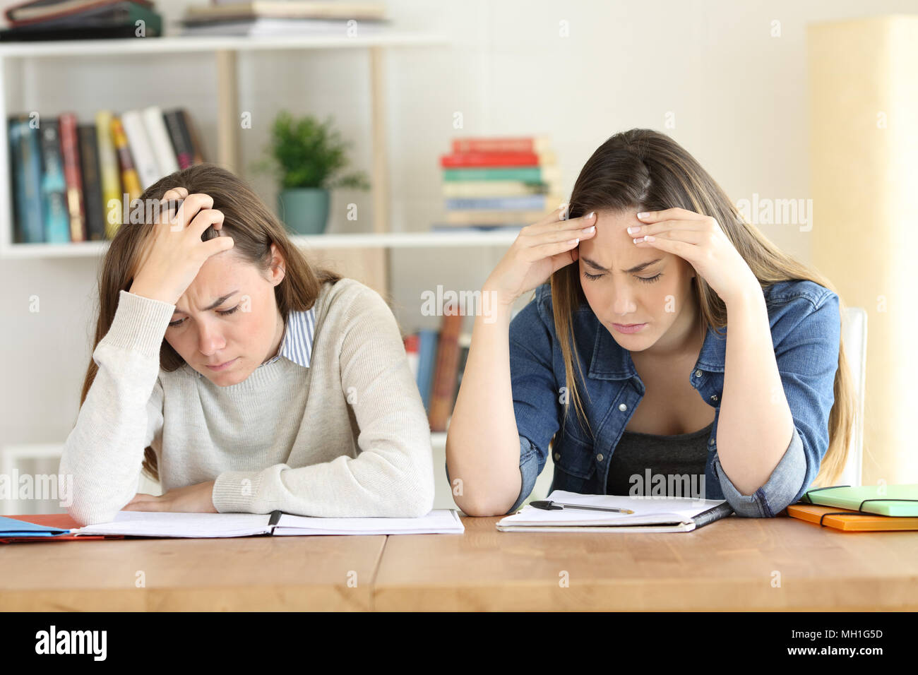 Two adults studying hi-res stock photography and images - Alamy