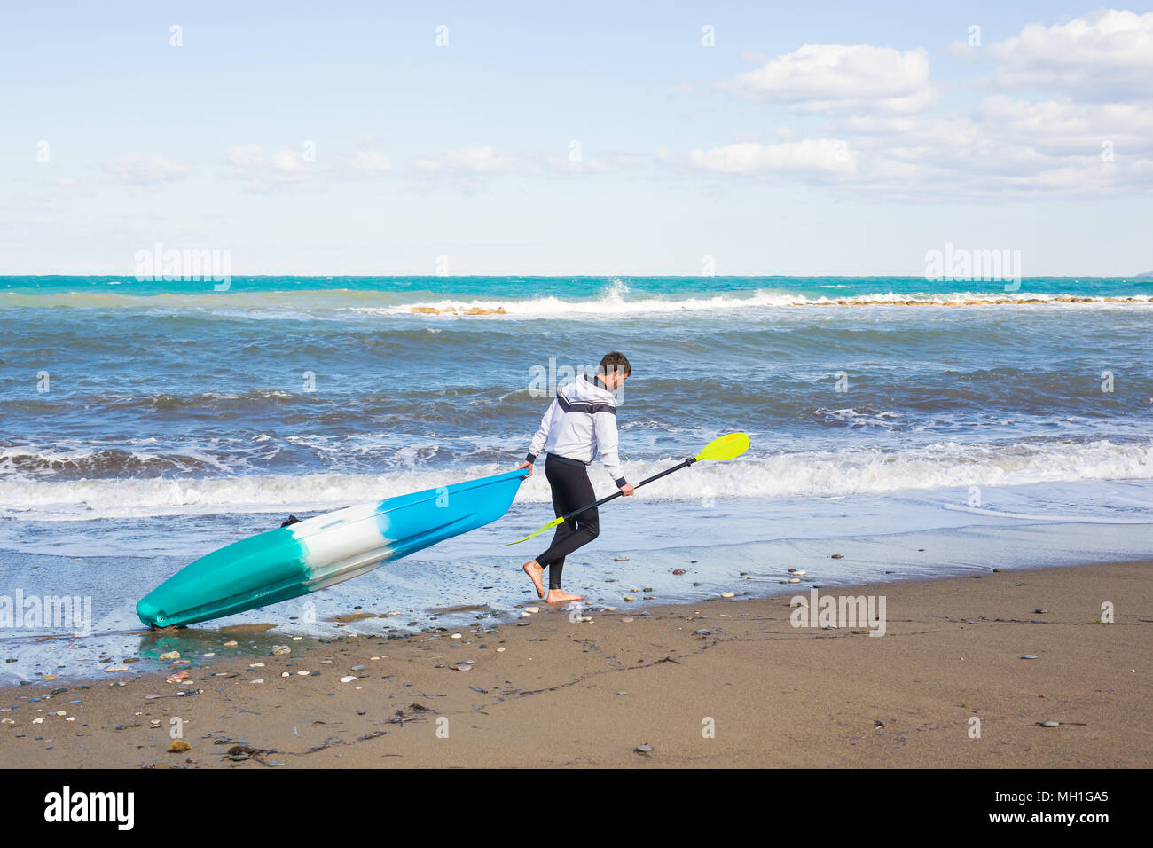 Carry kayak beach hi-res stock photography and images - Alamy
