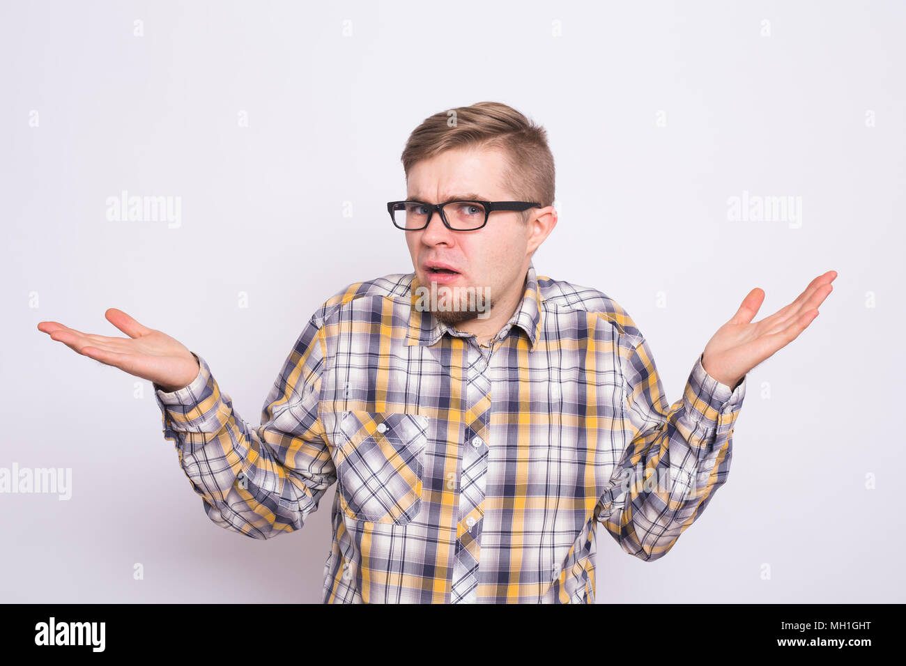 Young emotional surprised, frustrated and bewildered man. Human ... Young emotional surprised, frustrated and bewildered man. Human ...