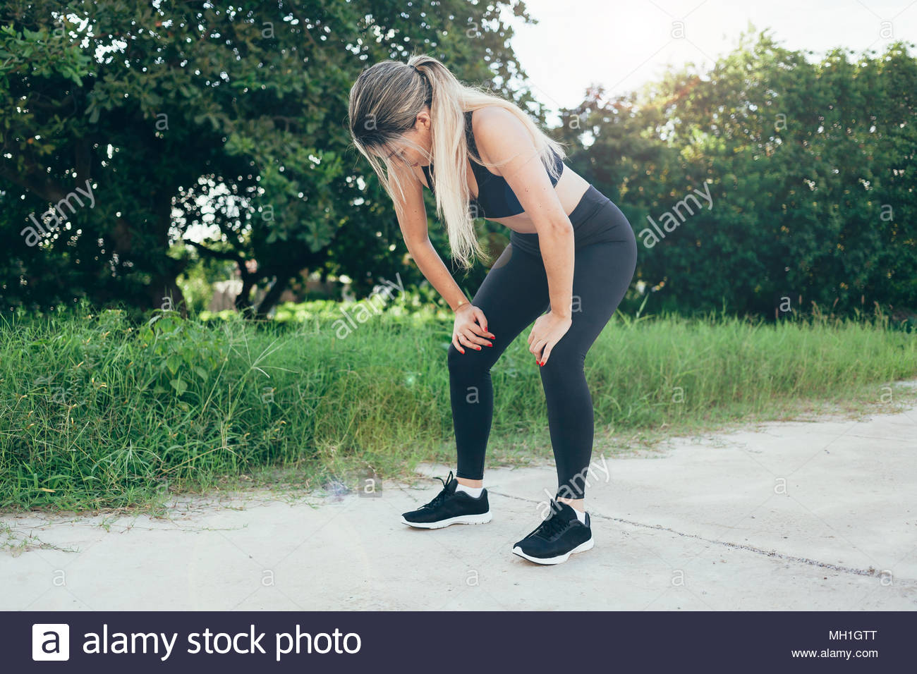 Exhausted Female Runner Stock Photos & Exhausted Female Runner Stock ...