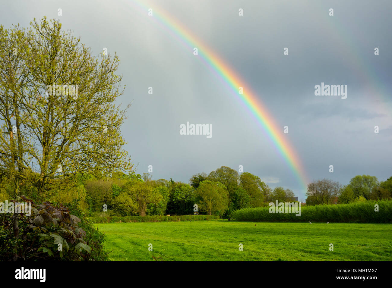 Rainbow over fields and countryside in Grantchester, Cambridge ...