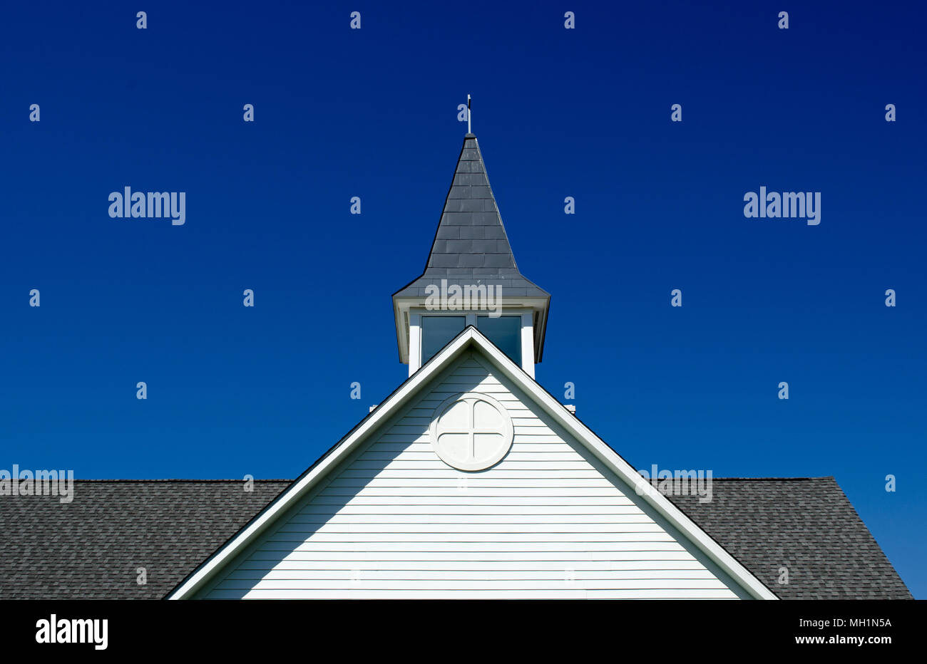 Top of a building with blue sky Stock Photo - Alamy