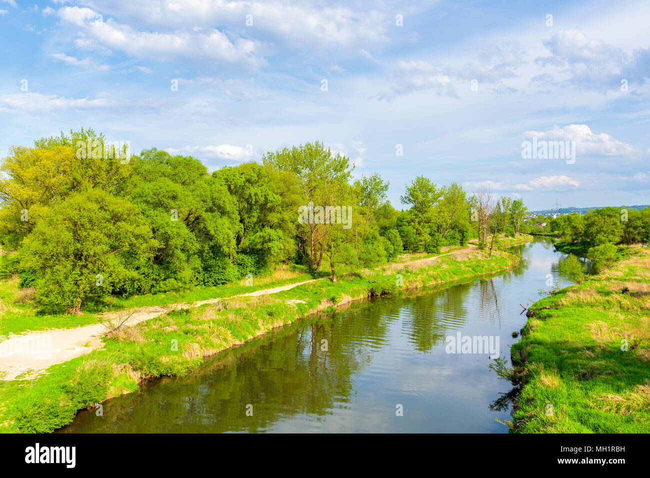 View of Vistula river and green fields near Tyniec village in ...