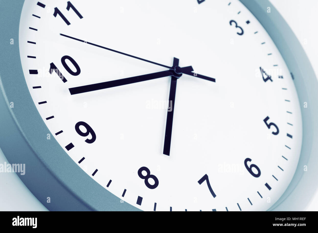 Closeup of hands on clock face Stock Photo - Alamy