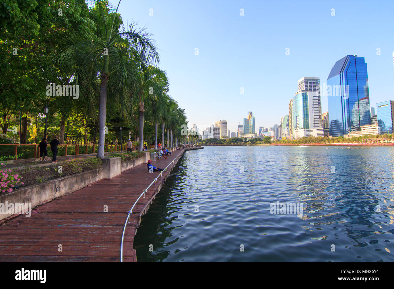 Lake view with reflections of the city / high building in the city lake ...