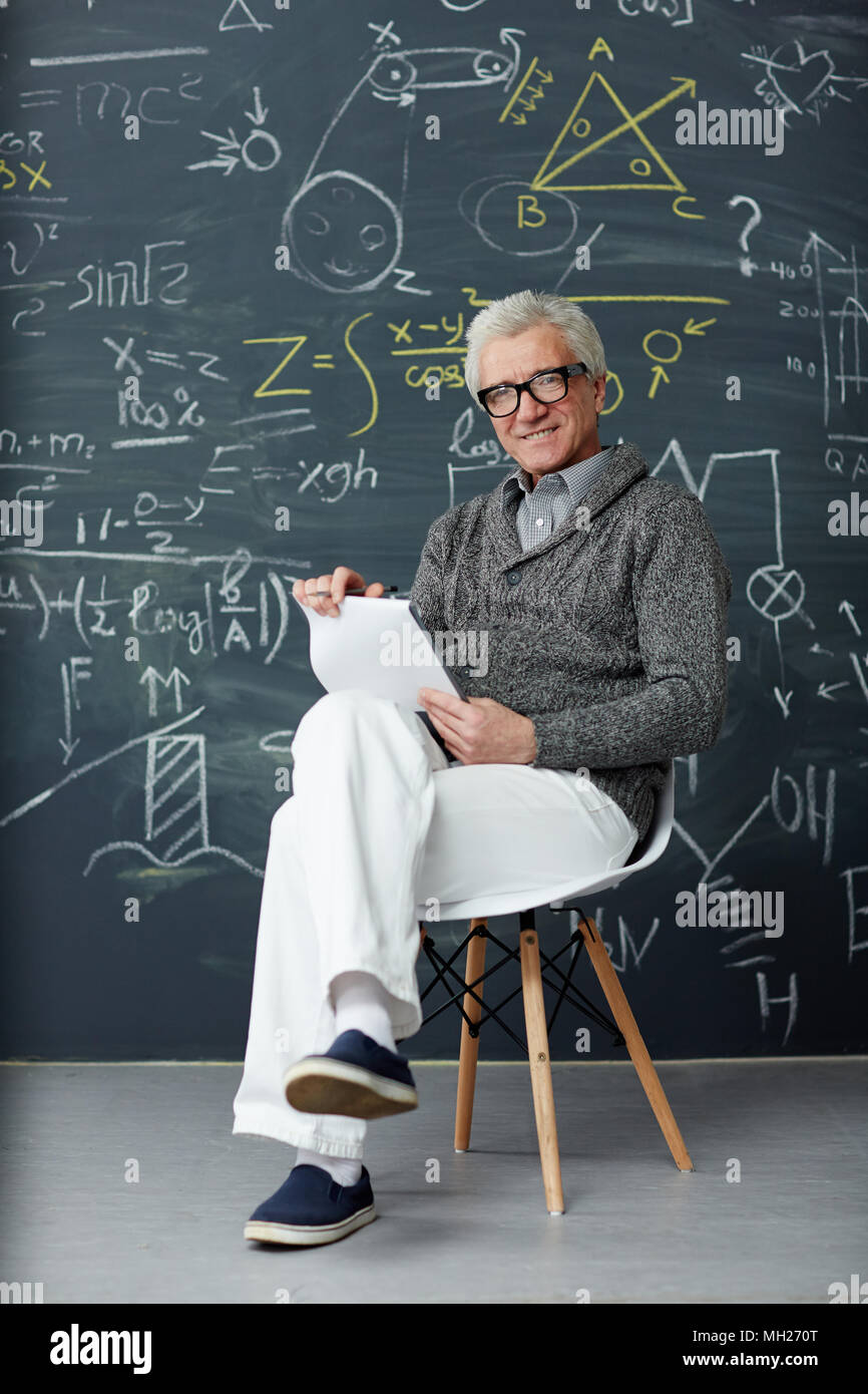 Professor by blackboard Stock Photo - Alamy