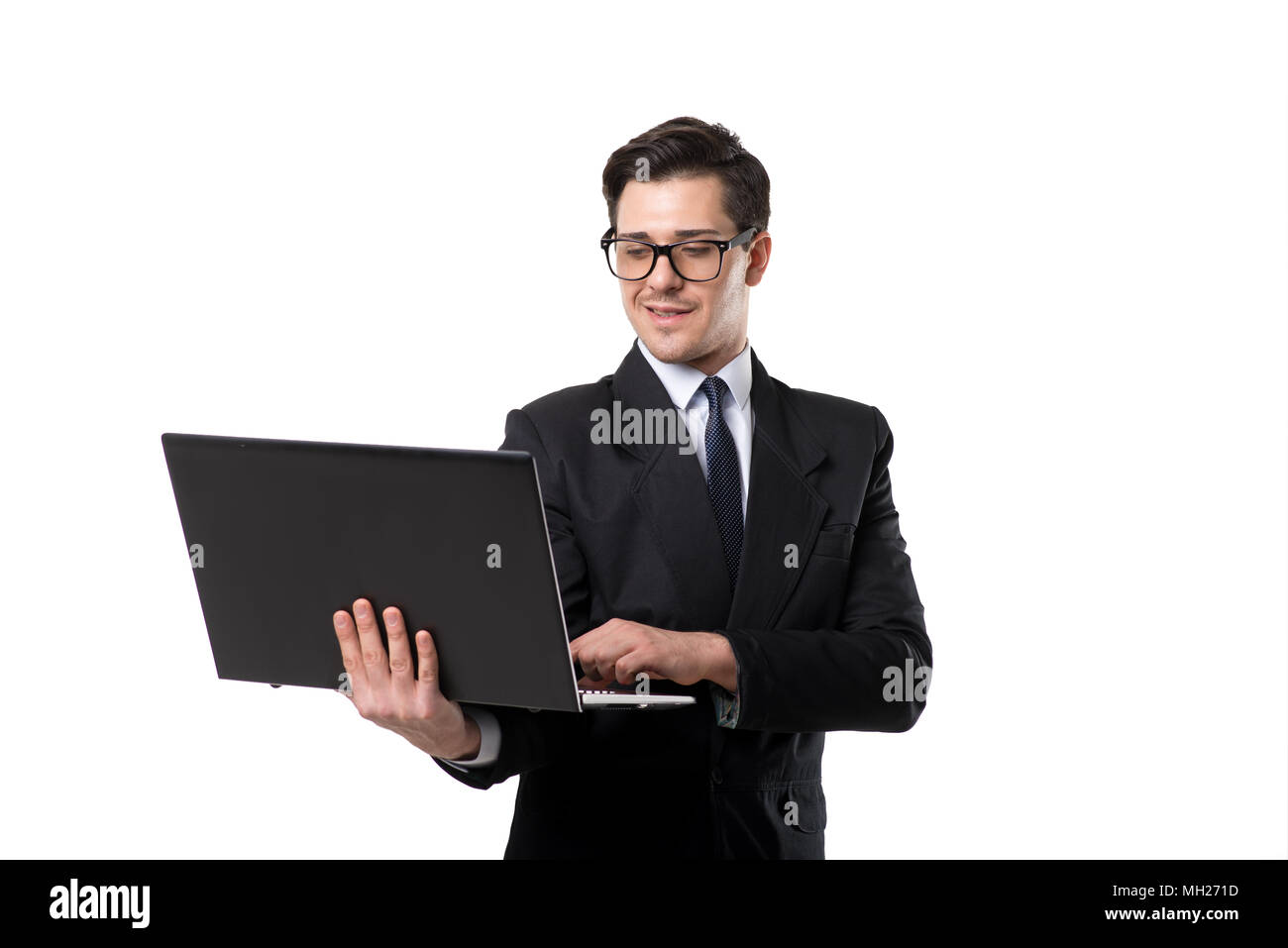 Businessman using laptop, white background Stock Photo - Alamy
