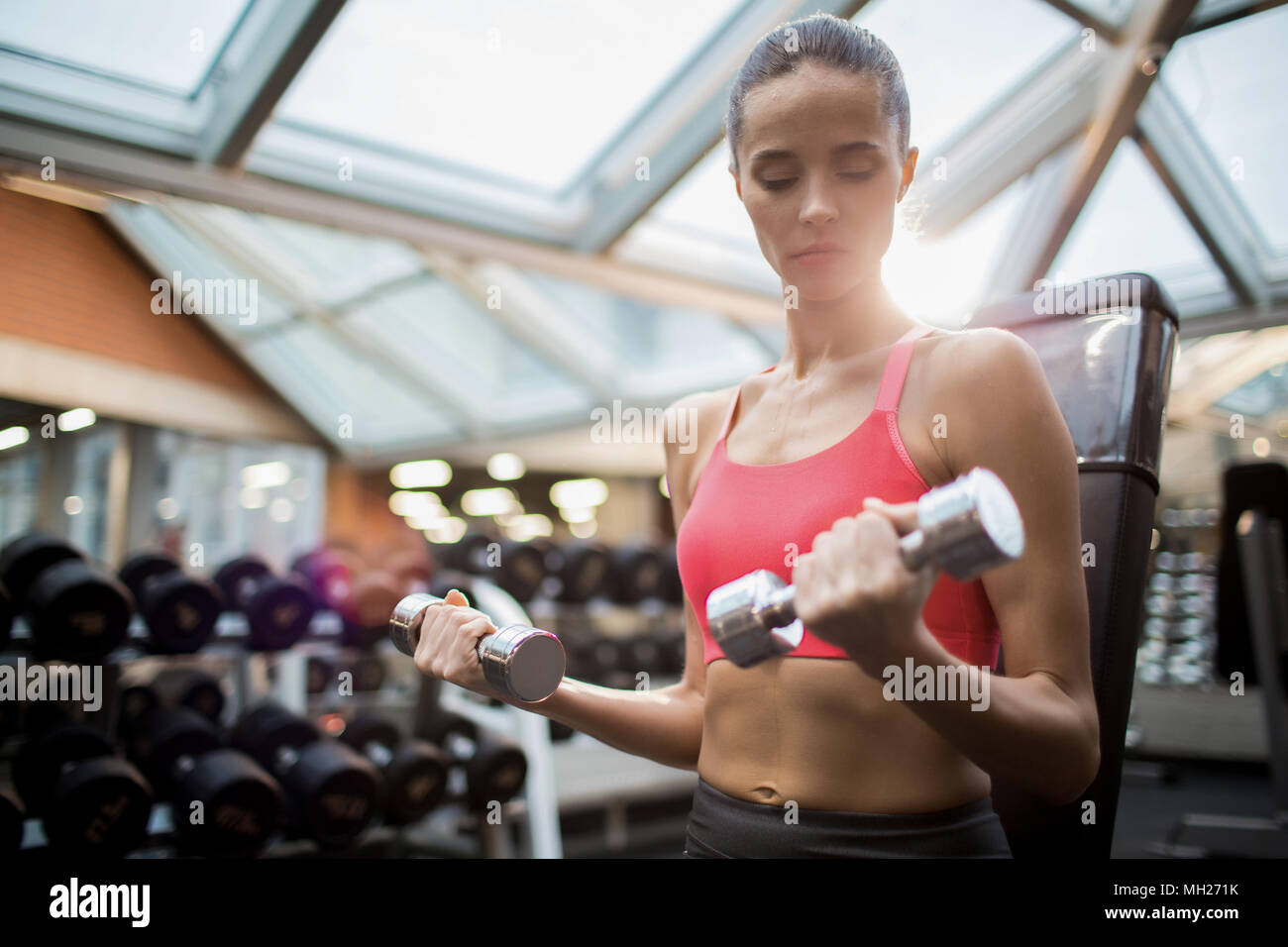Practicing dumbbells hi-res stock photography and images - Alamy