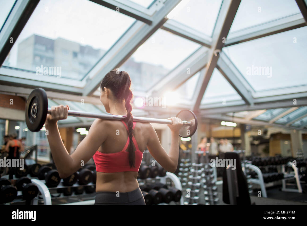 Cross training with barbell Stock Photo - Alamy