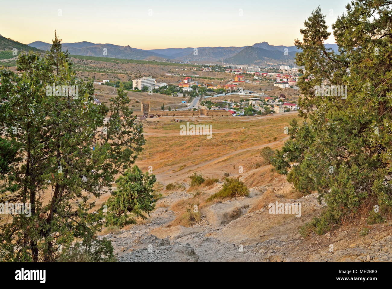 Panorama of Sudak from Genoese fortress in Sudak at sunset. Crimea ...