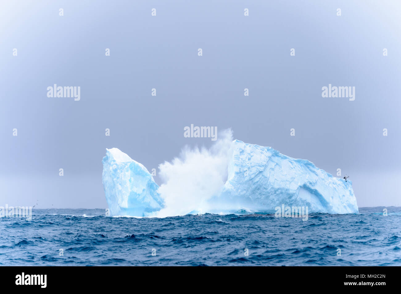 Iceberg in the ocean Stock Photo - Alamy
