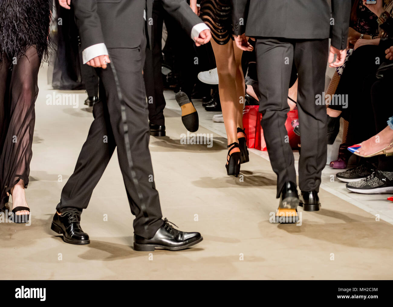 male and female models at the end of the fashion show Stock Photo - Alamy