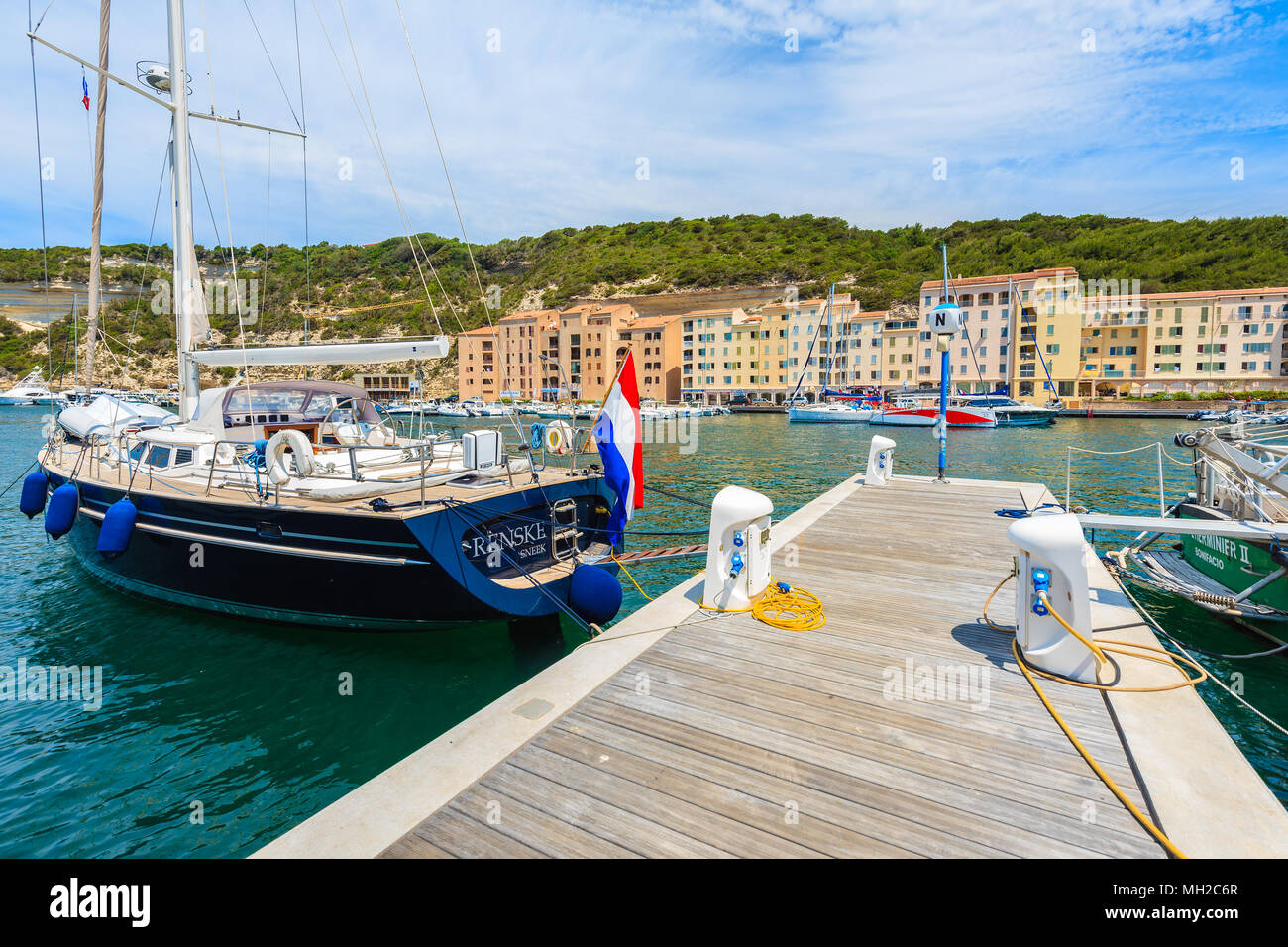 BONIFACIO PORT, CORSICA ISLAND - JUN 23, 2015: Sailing boat anchoring ...
