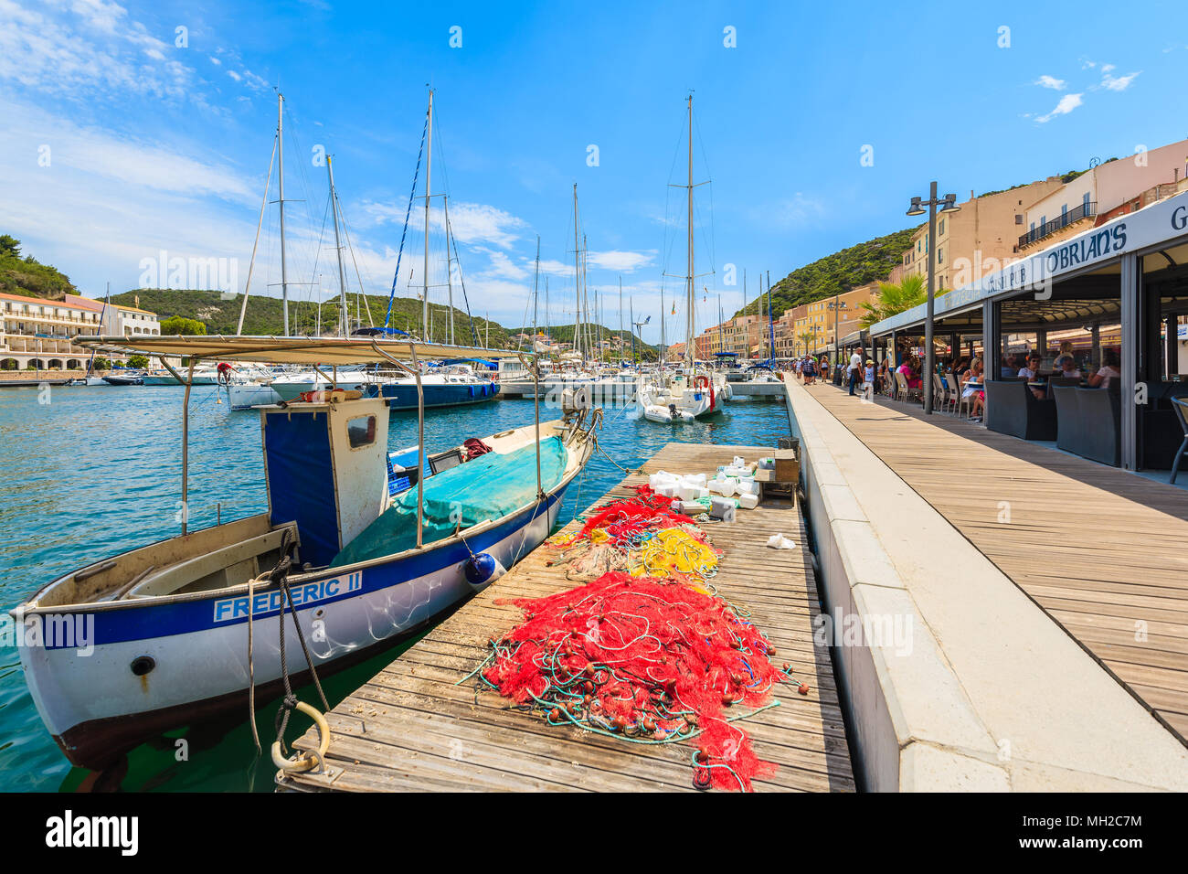 BONIFACIO PORT, CORSICA ISLAND - JUN 23, 2015: fishing boat anchoring ...