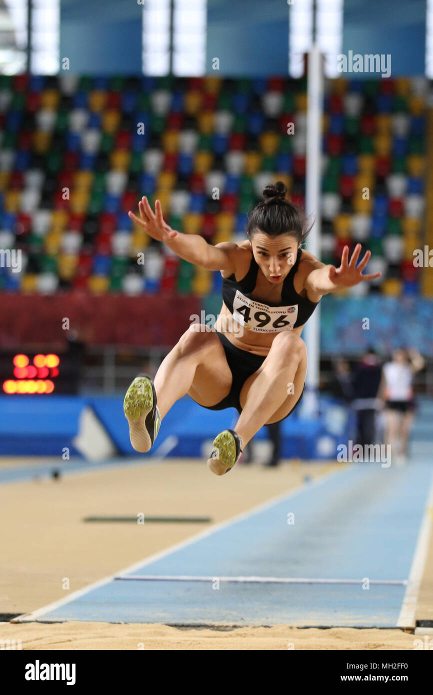ISTANBUL, TURKEY - JANUARY 14, 2018: Undefined athlete long jumping ...
